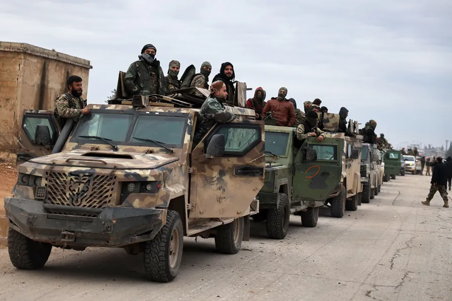 Syrian government forces enter two northern towns after Kurdish-led ...