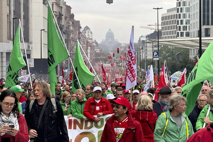 Thousands of workers protest massive job cuts at Brussels car factory ...