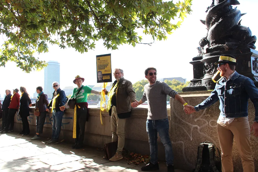 Thousands gather for human chain around parliament against extradition ...